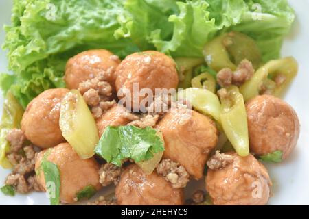 deep fried fish tofu ball with chop pork topping slice sweet green ...