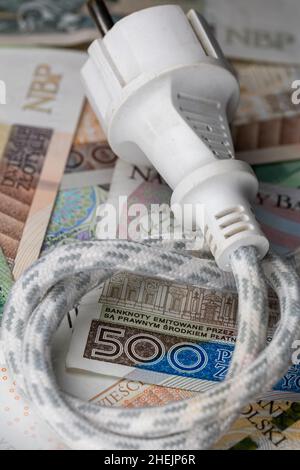 Money Polish zloty and price of electricity in Poland Stock Photo - Alamy