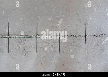 cut in the gray screed to avoid movement Stock Photo - Alamy