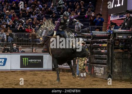 Alex Cardozo rides War Dress during the Professional Bull Riders 2022 ...