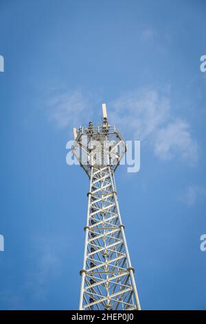 White Telephone pole with clear blue sky background Stock Photo - Alamy