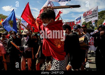 Protesters destroy an effigy of Philippine President Rodrigo Duterte ...