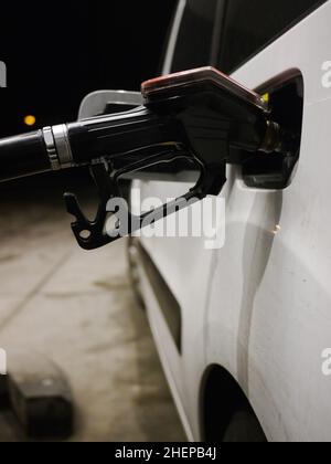 someone filling up car with fuel for driving Stock Photo - Alamy