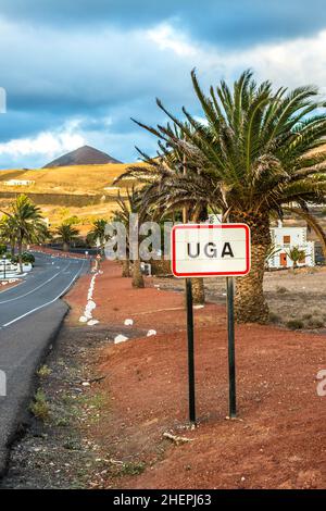 Street sign of village of UGA in evening light in Lanzarote Stock Photo ...
