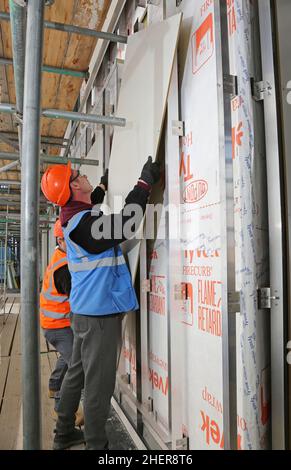 Construction of a residential building and cladding with insulation ...