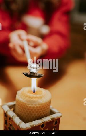 New Year's Eve, lead pouring over candlelight, studio photography with ...
