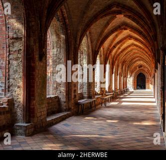 The Gothic monastery with its monastery church and the arcades inside ...