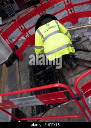 Vorboss engineers fitting cables behind street barriers for Vorboss ...