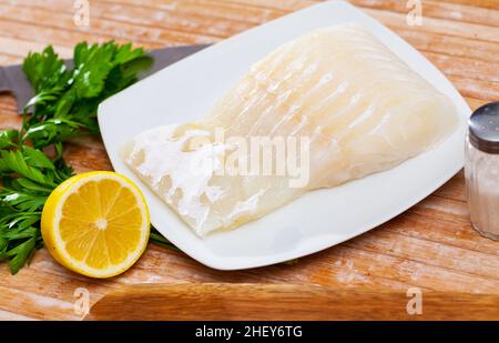 Raw pink cusk-eel fish fillet, seafood ingredients Stock Photo - Alamy