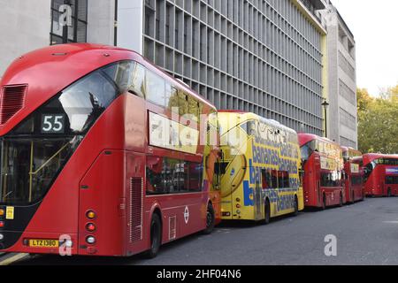 A London New Routemaster bus to Marylebone with pink and black Magnum ...