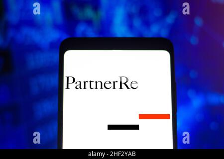 In this photo illustration, a PartnerRe logo is seen displayed on a ...