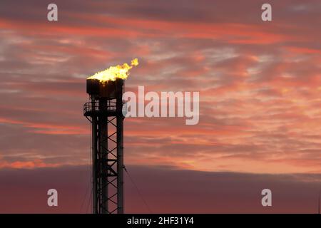 Oil and gas terminal with flaring burning of combustible exhaust gases ...