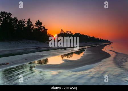 A sandbar at sunset off shore on Lake Erie at Long Point Poinr ...
