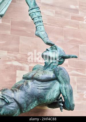 Archangel Michael defeats Lucifer, on exterior wall of Coventry ...