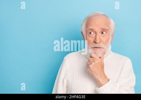 Photo of clever aged grey beard man touch eyewear look empty space wear ...