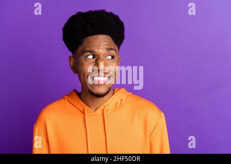 Photo of cool cheerful dreamy afro american woman point finger empty ...