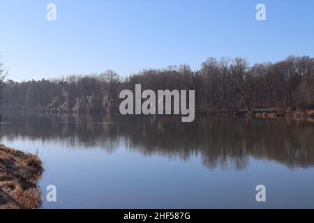 lake trees reflection sunshine january Stock Photo - Alamy