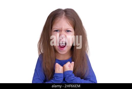 Little angry girl screaming at the camera Stock Photo - Alamy