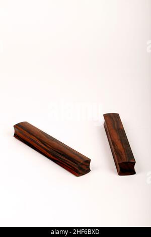 Claves, (decorated) percussion instrument Stock Photo - Alamy