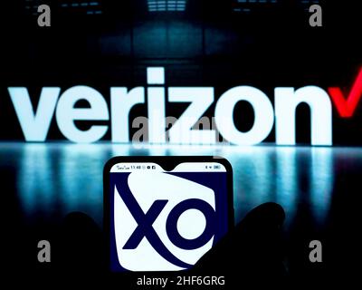 In this photo illustration, a Verizon Communications Inc. logo seen ...