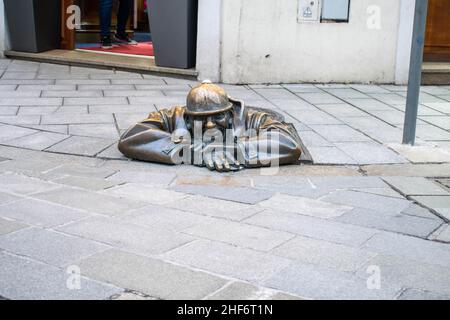 Cumil, The Man at Work statue, aka, The Watcher. Famous sculpture in ...