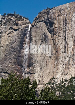 famous rock formation with lower yosemite waterfall in the romantic ...