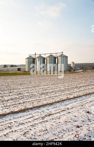 acres with snow in winter with silo in beautiful light and structure ...