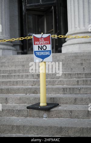 US Government no trespassing sign against a blue sky Stock Photo - Alamy