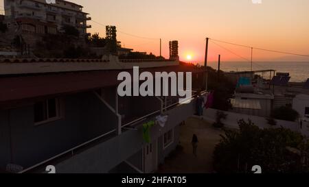 sunset on Albania beach shiny Stock Photo - Alamy