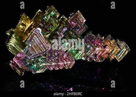 Synthetic bismuth Bismuthum crystal with iridescent oxide film on white ...