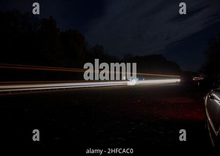 Lights from passing cars. Tracer Stock Photo - Alamy