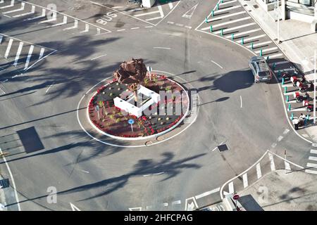 roundabout with sculpture of old cars Stock Photo - Alamy