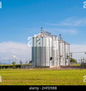 beautiful silver silos in landscape Stock Photo - Alamy