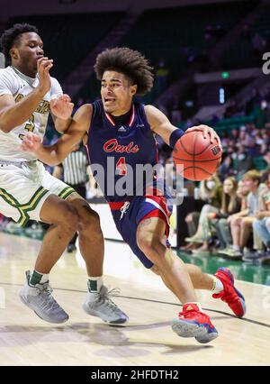 Florida Atlantic guard Bryan Greenlee (4) defends UAB forward Yaxel ...