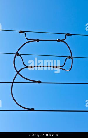 Overhead contact wires Stock Photo - Alamy