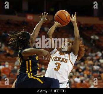 Texas guard Rori Harmon shoots over James Madison guard Ashanti Barnes ...