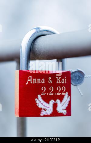 Inscription in red numbers 2022 from gingerbread on white background ...