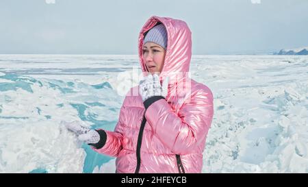 face of beautiful girl with piece of ice Stock Photo - Alamy
