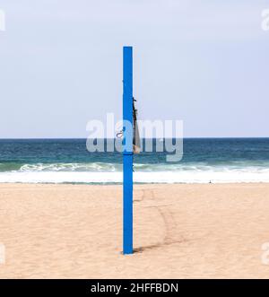 volleyball post at the beach in blue Stock Photo - Alamy