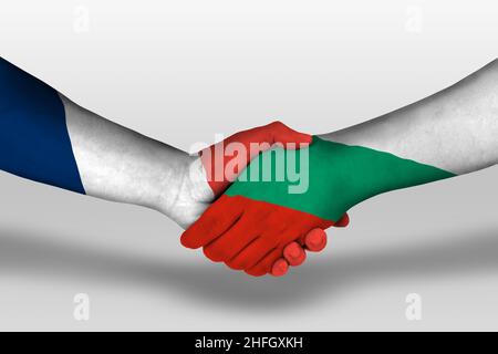 Handshake between france and belgium flags painted on hands ...