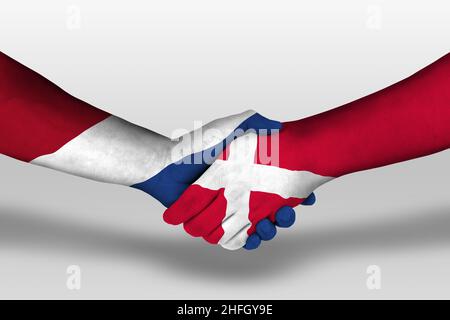 Handshake between Cuba and Netherlands flags painted on hands, isolated ...