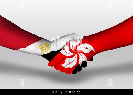 Handshake between Egypt and Germany flags painted on hands, isolated ...