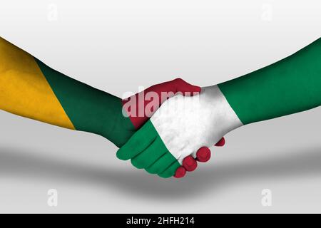 Handshake between lithuania and nigeria flags painted on hands ...