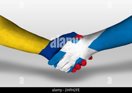 Handshake between columbia and scotland flags painted on hands ...
