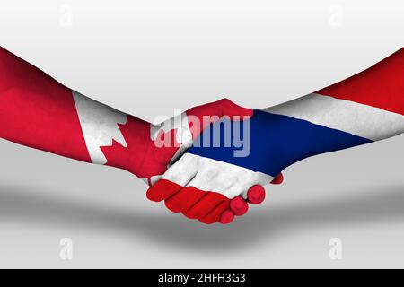 Handshake between Canada and Thailand flags painted on hands, isolated ...