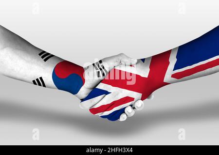Handshake between South Korea and United Kingdom flags painted on hands ...