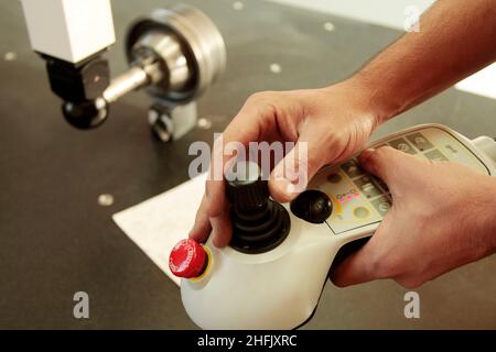 CMM probe measuring on steel cylinder. CMM probe Machine control ...