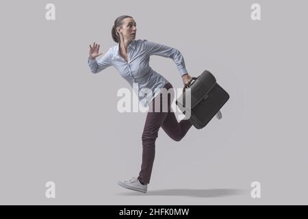 frightened woman running away from thief in underpass Stock Photo - Alamy