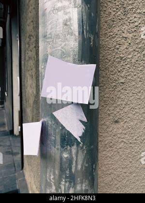 Pasting Poster on Wall Stock Photo - Alamy
