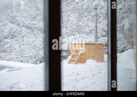 Wooden hot vat on terrace at mountains. vacation concept with hot bath ...